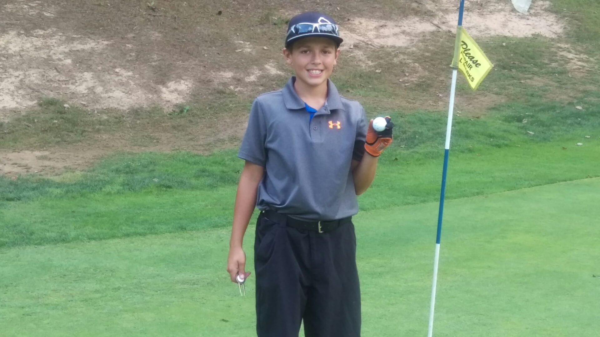 Adam Slone, age 12 Sinks his first ACE!